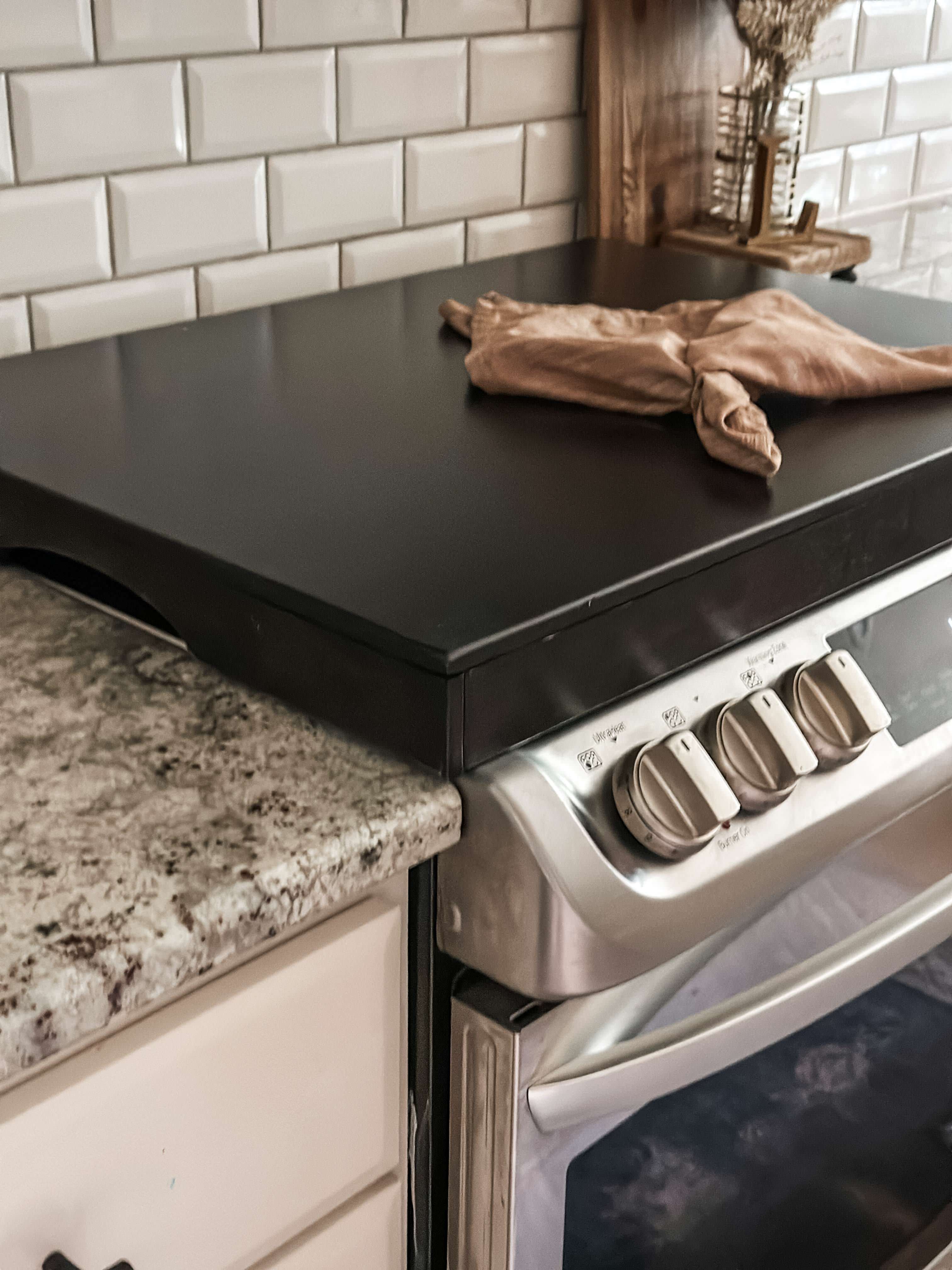 Clean and simple minimalist black stove cover – The LoveMade Home